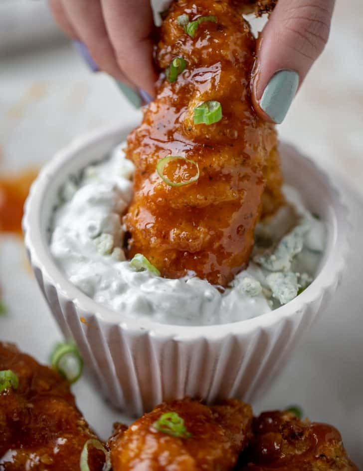 Sticky Chicken fingers with Yogurt Blue Cheese Sauce