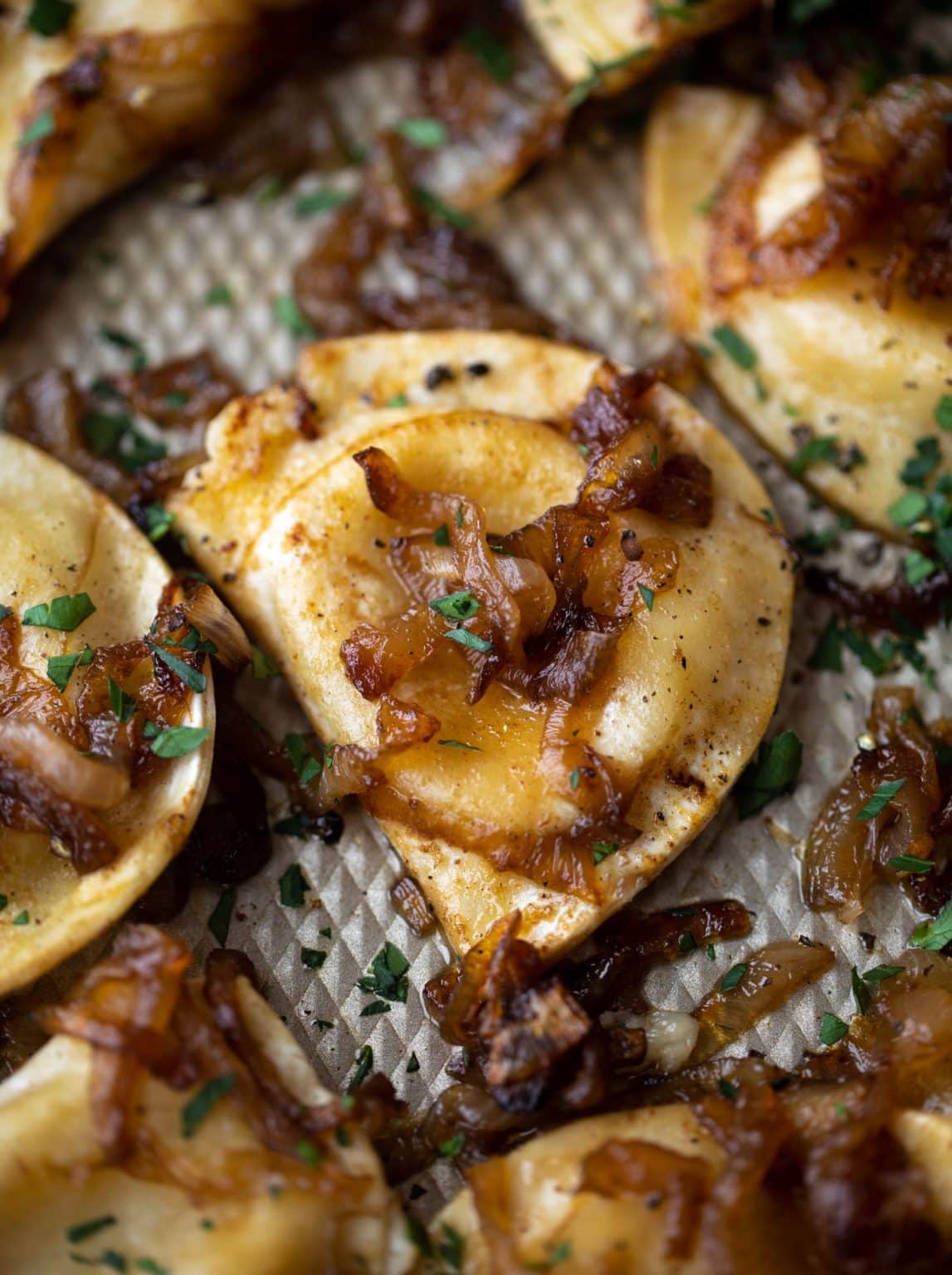 Sheet Pan Pierogies with Caramelized Onions and Chipotle Sour Cream